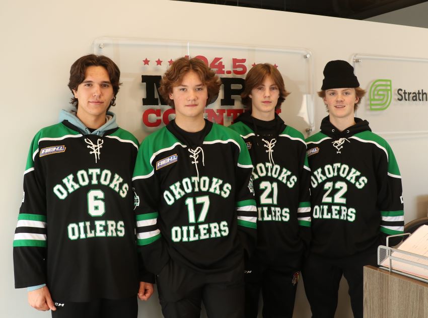 Four local AAA hockey players will play their first home game in Strathmore this weekend ...